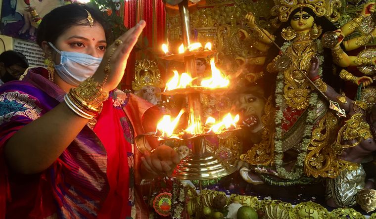 TMC, BJP vie for Durga puja pie ahead of 2021 Bengal polls- The Week