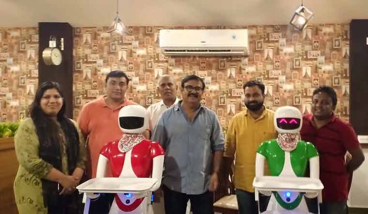 Robots serve food, entertain kids at this Kerala restaurant - The Week