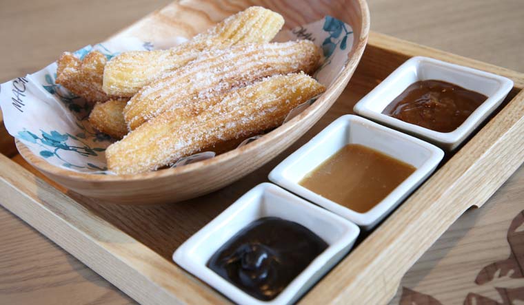 A case for churros con choco with coffee for breakfast- The Week