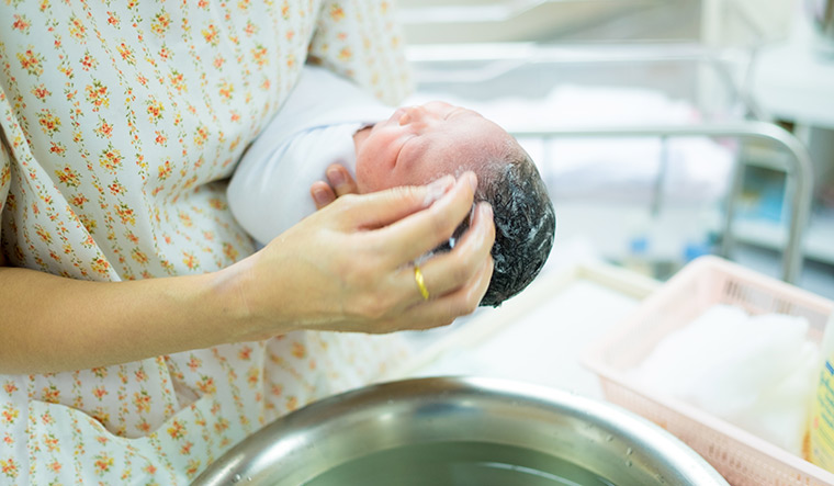 Delay first bath- The Week