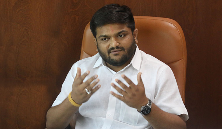 BJP's Hardik Patel leads over AAP candidate, sitting Congress MLA a ...