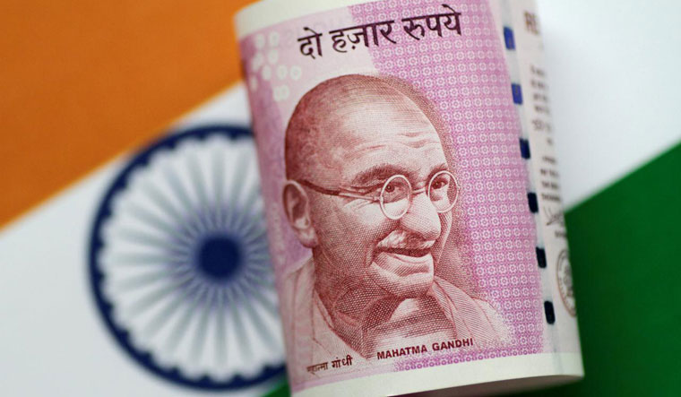 Rupee tanks to 71 against dollar, drops by 26 paise- The Week