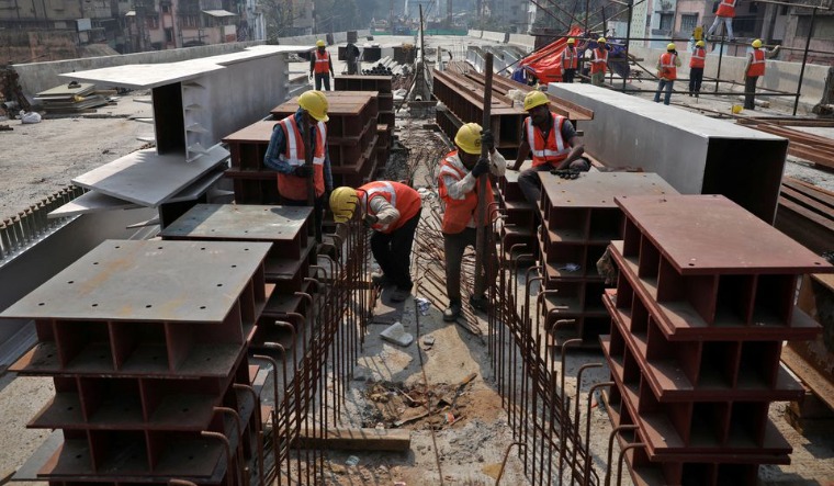 Delhi govt provides free bus passes to construction workers- The Week