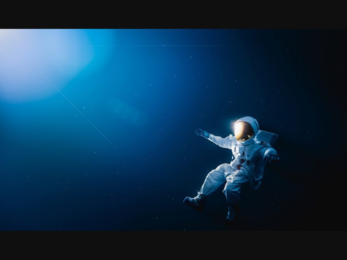 Person Floating In Outer Space