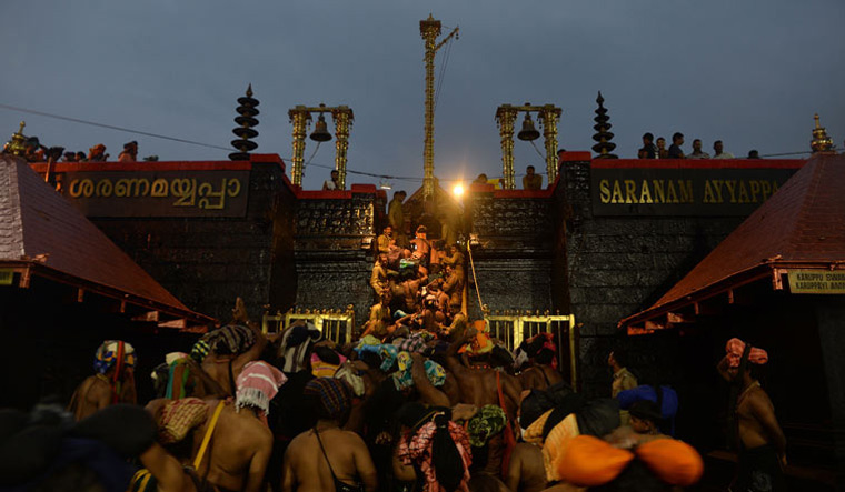 Sabarimala: Faced with protests, 11 women abandon trek to hill shrine ...