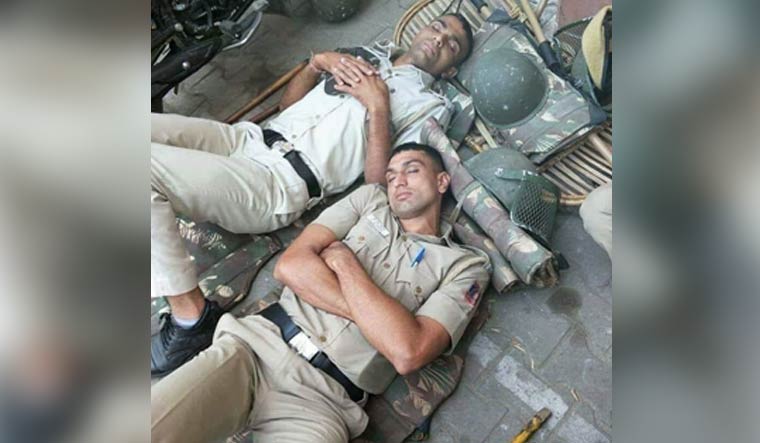 "Comfortable bed is a luxury if you are a cop": Photo of sleeping cops ...