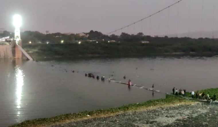 At least 60 dead as suspension bridge collapses in Gujarat's Morbi- The Week