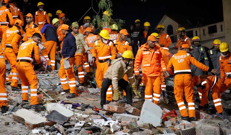 Lucknow building collapse: Five people still trapped as rescue ...