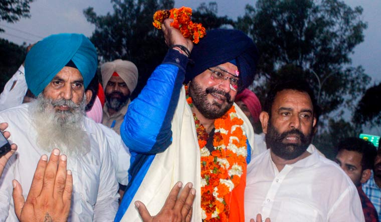 Navjot Singh Sidhu walks out of jail after 10 months, says 'democracy ...