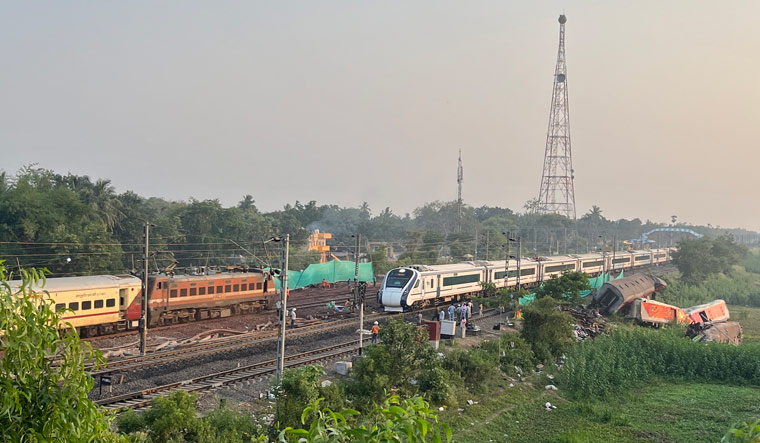 Stunned silence as passengers cross triple train disaster site- The Week