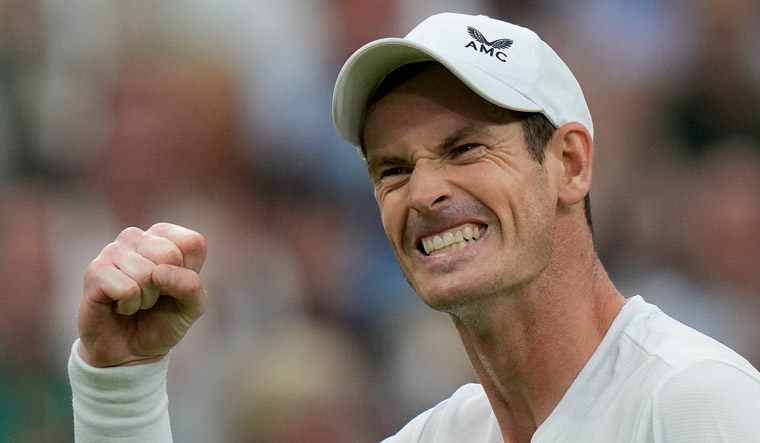 Andy Murray gets a win at rainy Wimbledon and a thumbs-up from Roger ...