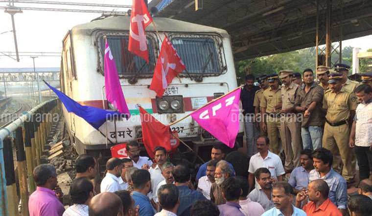 2-day nationwide workers' strike begins; protesters block rail tracks ...