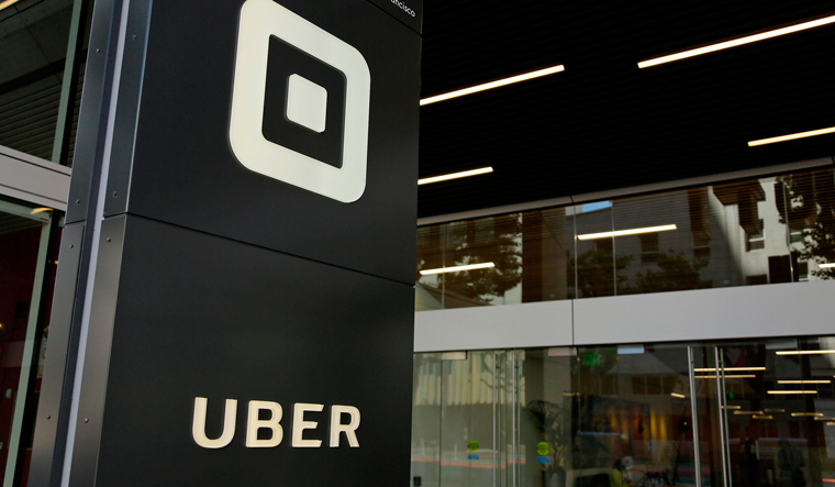 Uber trims losses and grows business, plans new stock sale- The Week