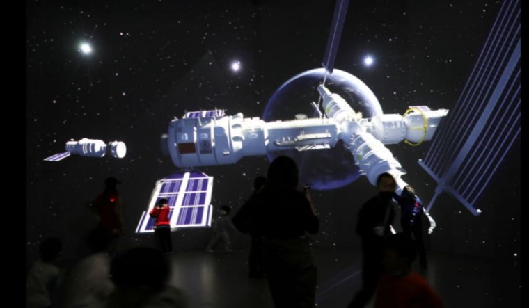 Astronauts at China’s new Tianhe space station conduct first spacewalk ...