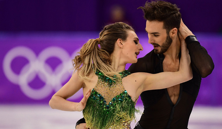 Wardrobe malfunction affects ice dancer during event- The Week