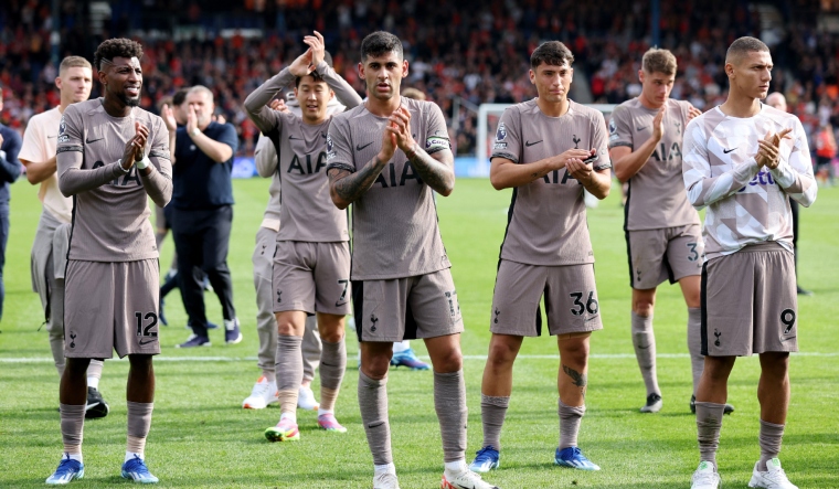 Man down, Tottenham earn hard-fought win against Luton to become ...