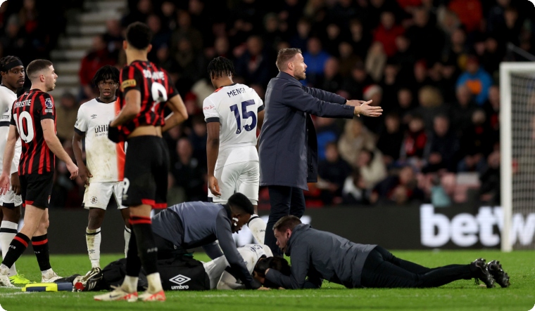 Tom Lockyer collapses during Bournemouth vs Luton Town Premier League ...