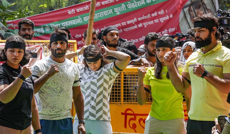 Protesting wrestlers wear black bands as mark of protest, call it a ...