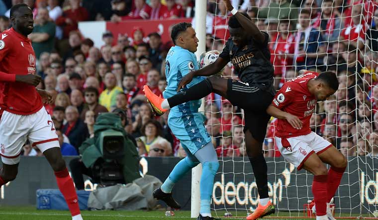 Man City win English Premier League after Arsenal lose at Nottingham ...