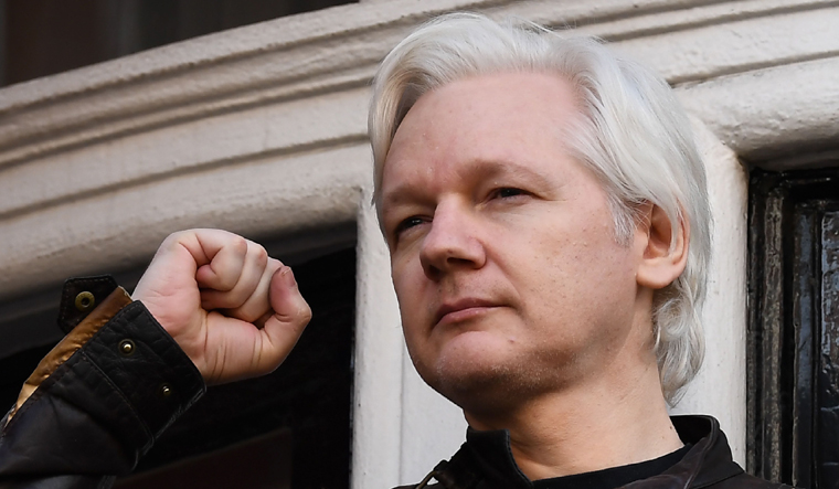 Julian Assange weds fiancee in London prison ceremony- The Week
