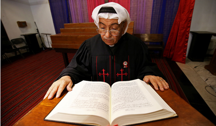 Kuwait's homegrown priest celebrates Bible and bedouin culture- The Week