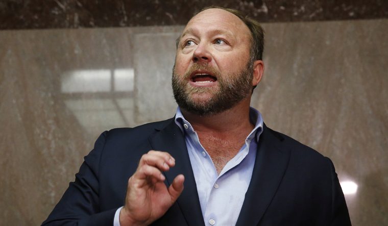 Alex Jones and Infowars are finally off Twitter- The Week