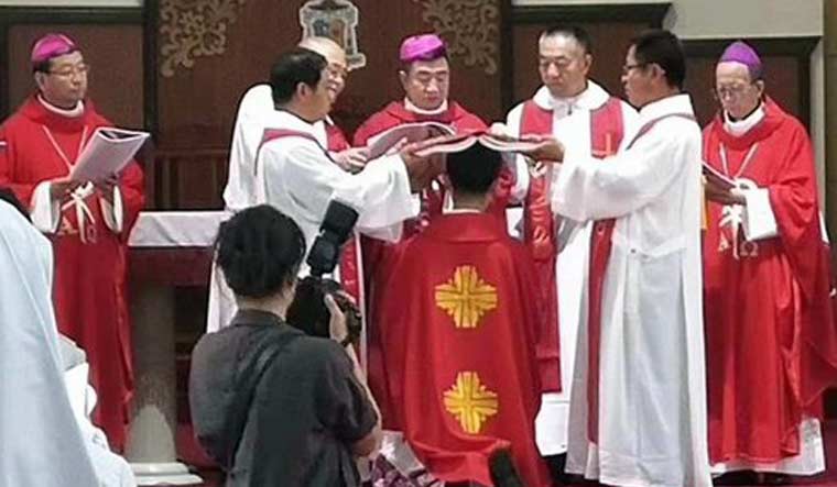 First bishop ordained in China under Vatican deal- The Week