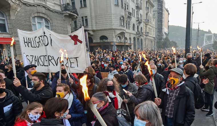 Hungary: Thousands of students march with torches for academic freedom ...
