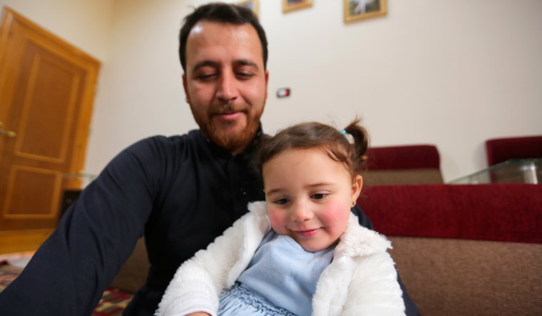 Syrian father-kid, who played game to overcome fear of bombing, now ...