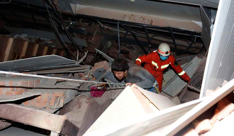 70 trapped after hotel used for coronavirus quarantine collapses in ...