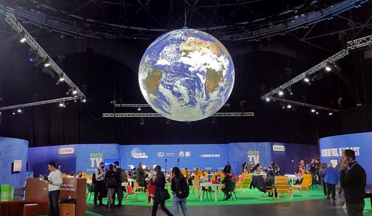 On day 1 of COP26, a $100 billion reminder and a plea from indigenous ...