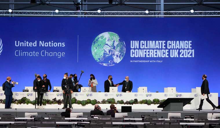 COP26: India voices opposition to sections on phasing out fossil fuels ...