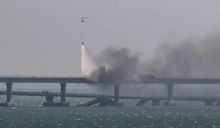 Crimea bridge partially reopened, Russian divers to examine damage- The ...