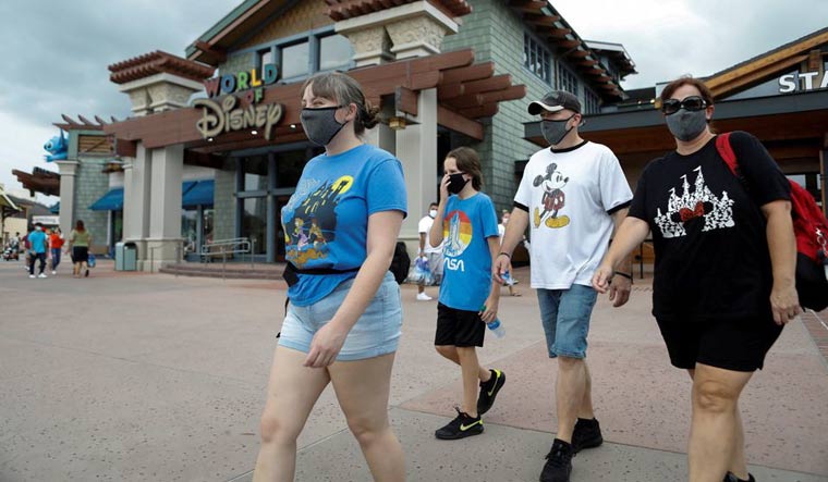 Disneyland to make masks optional for fully vaccinated guests- The Week