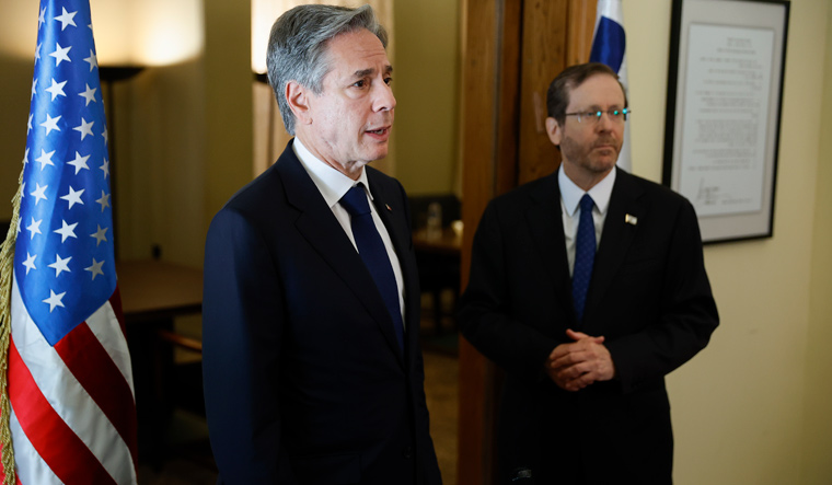 Blinken says protect civilians as Israeli troops encircle Gaza City ...