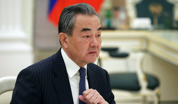 China's Foreign Minister Wang Yi heads to Moscow after meeting with US ...