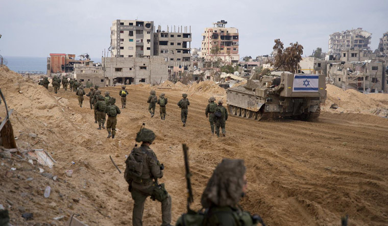 Israeli troops raid West Bank, kills 4 militants; air strikes continue ...