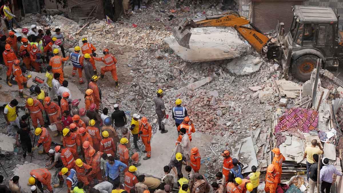 VIDEO | Four dead, several feared trapped after 4-storey building ...