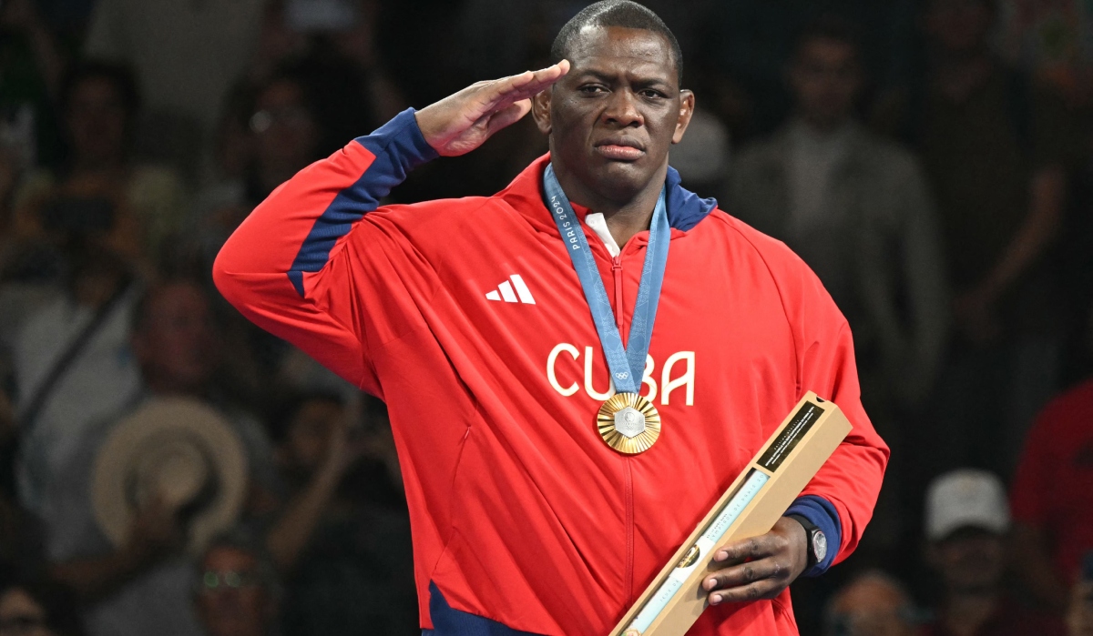 Cuban grappler Mijain Lopez: First Olympic athlete to win five ...