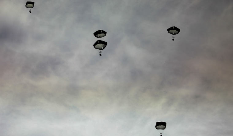 US military aircraft airdrops meals into Gaza in emergency aid ...