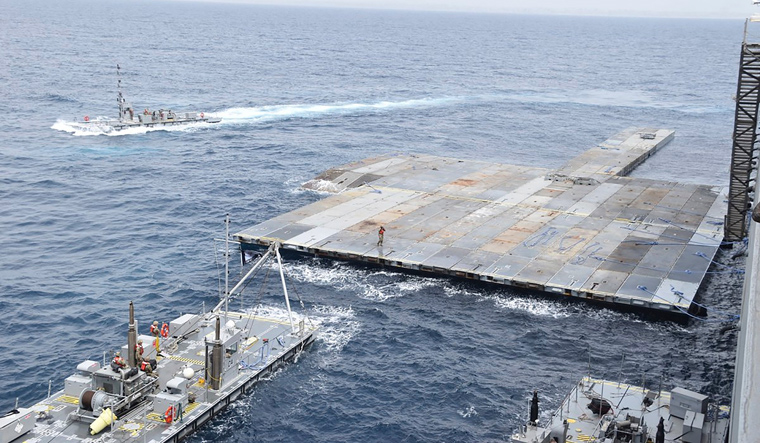 Gaza aid: US military ships are working to build a pier costing $320 ...
