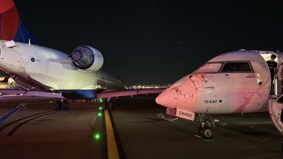LaGuardia Airport Delta planes collide: Pictures as jet's wing crashes ...